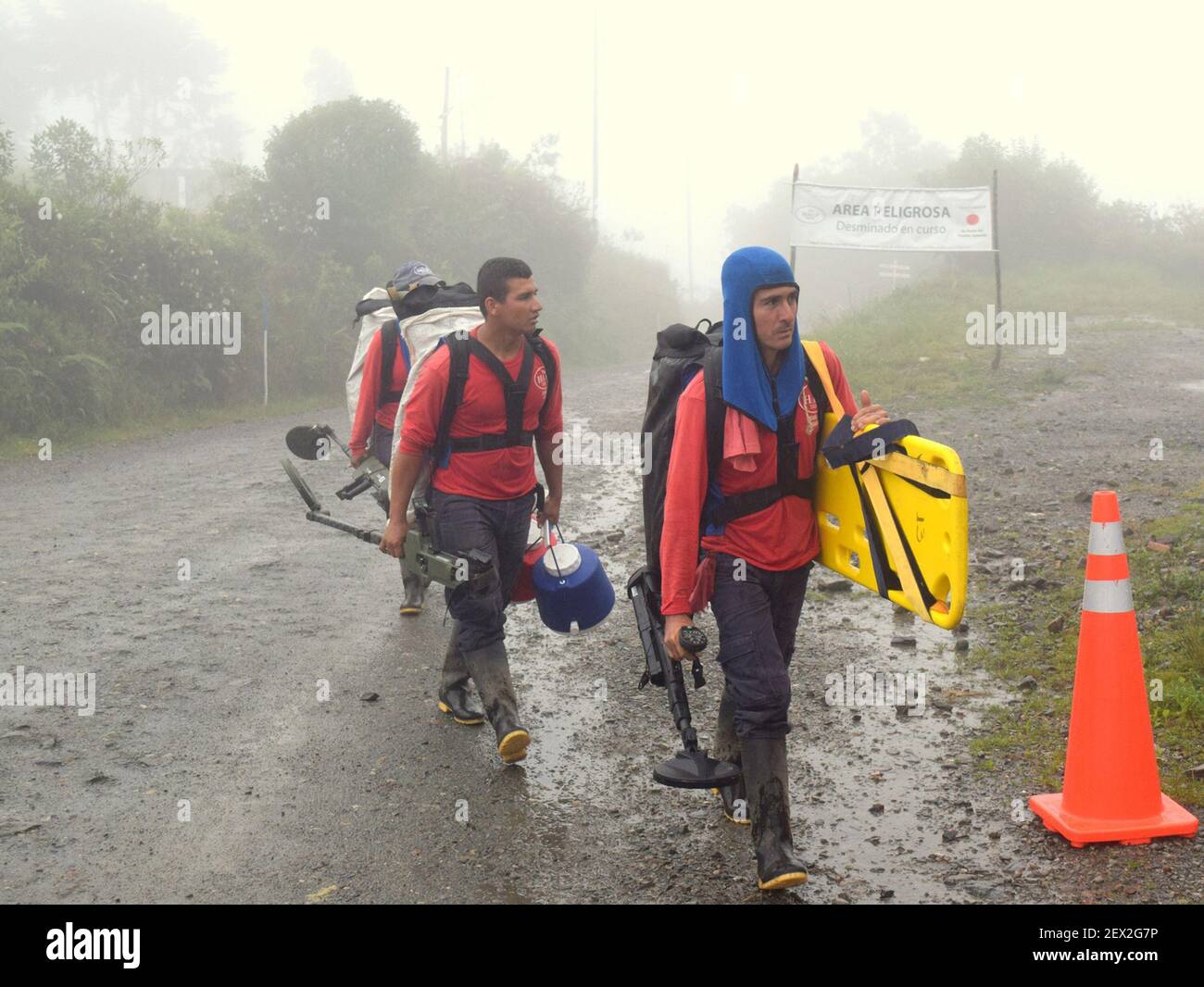 Landmine removal experts near Sonson, Colombia, return to camp after a ...