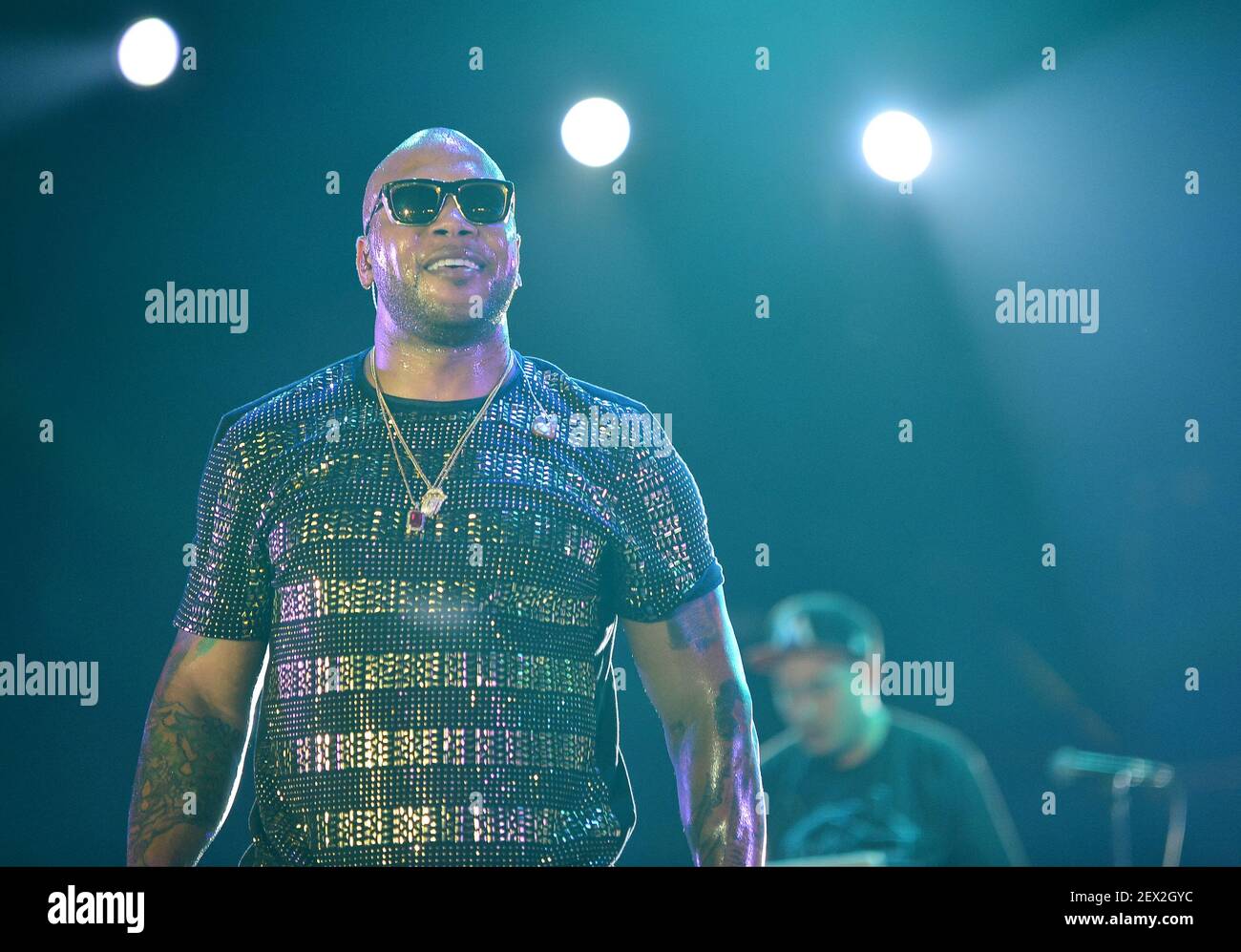 Flo Rida performs onstage during the Miami Beach 100th birthday ...
