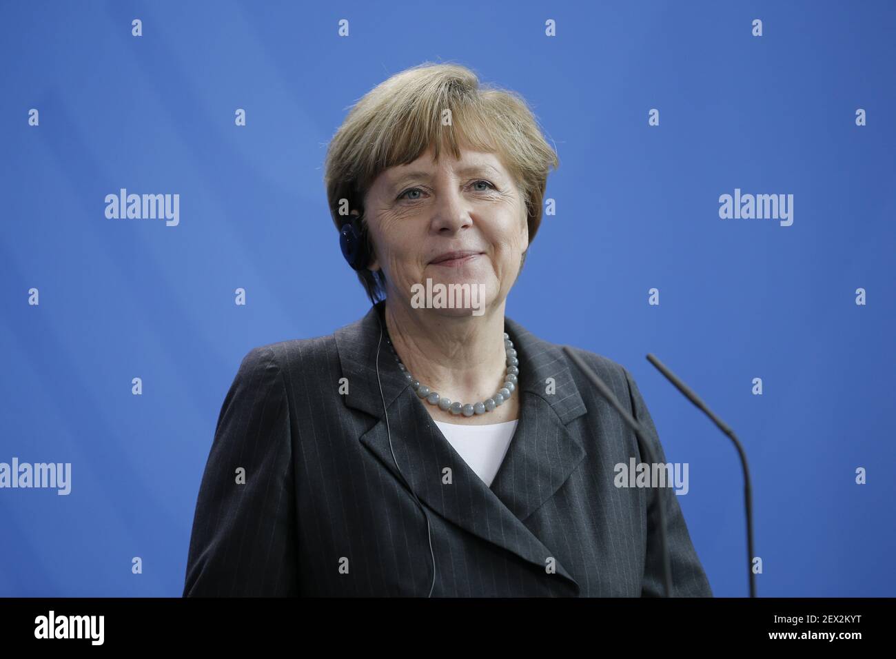 President of Kyrgyzstan, and the German Chancellor Angela Merkel give a ...