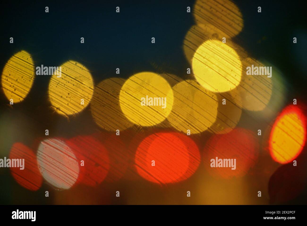 color round bright light spots on abstract background Stock Photo - Alamy