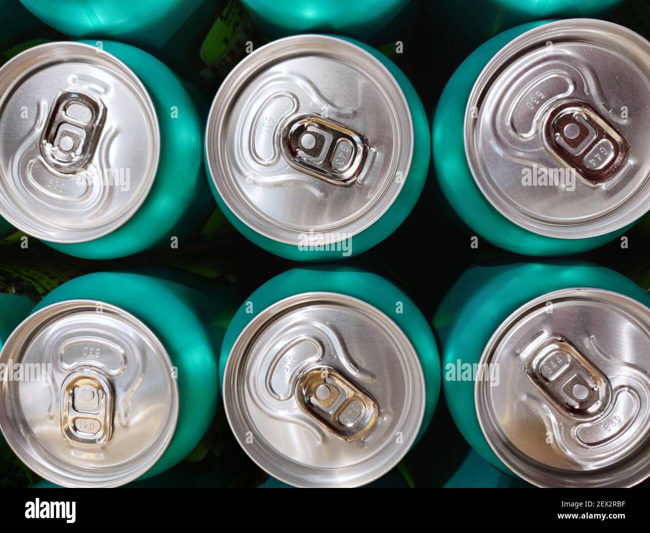 A top view of many green aluminum cans Stock Photo - Alamy