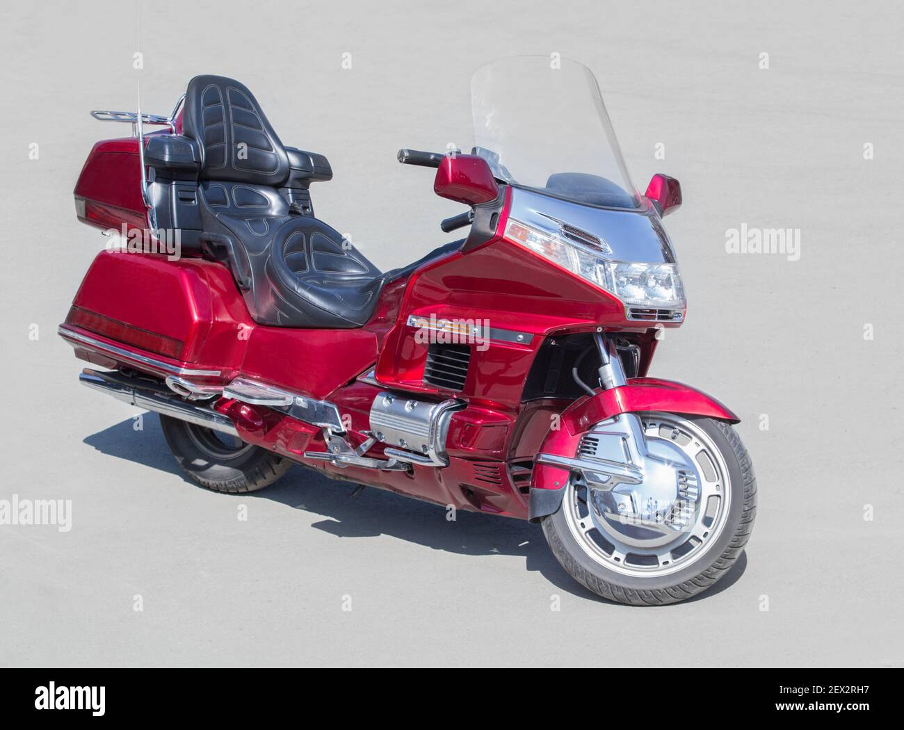 big beautiful red motorcycle on asphalt Stock Photo - Alamy