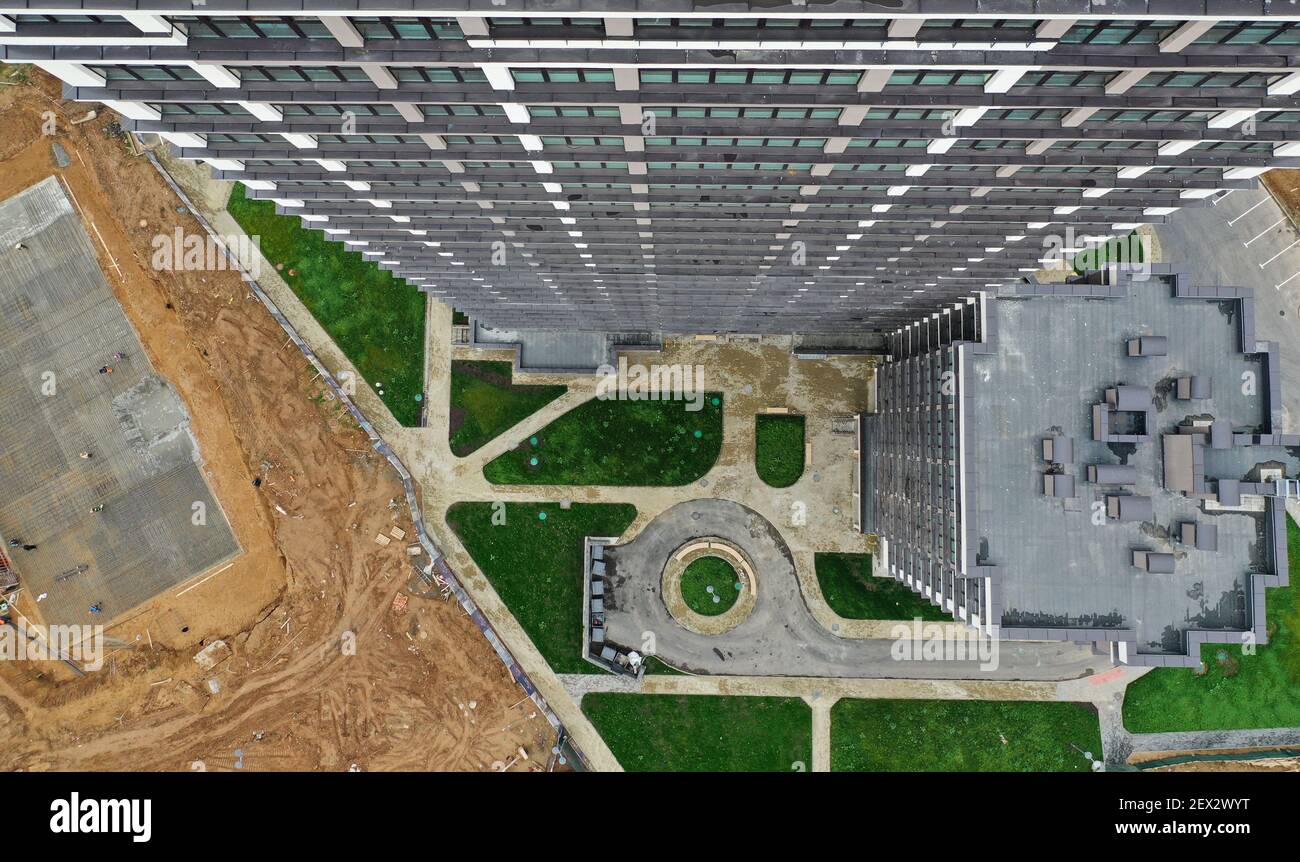 New beautiful modern multistorey building top view Stock Photo - Alamy