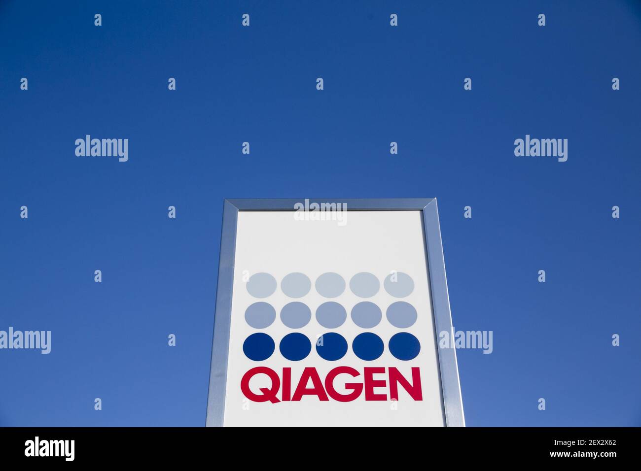 A logo sign outside outside a facility occupied by Qiagen in Germantown ...