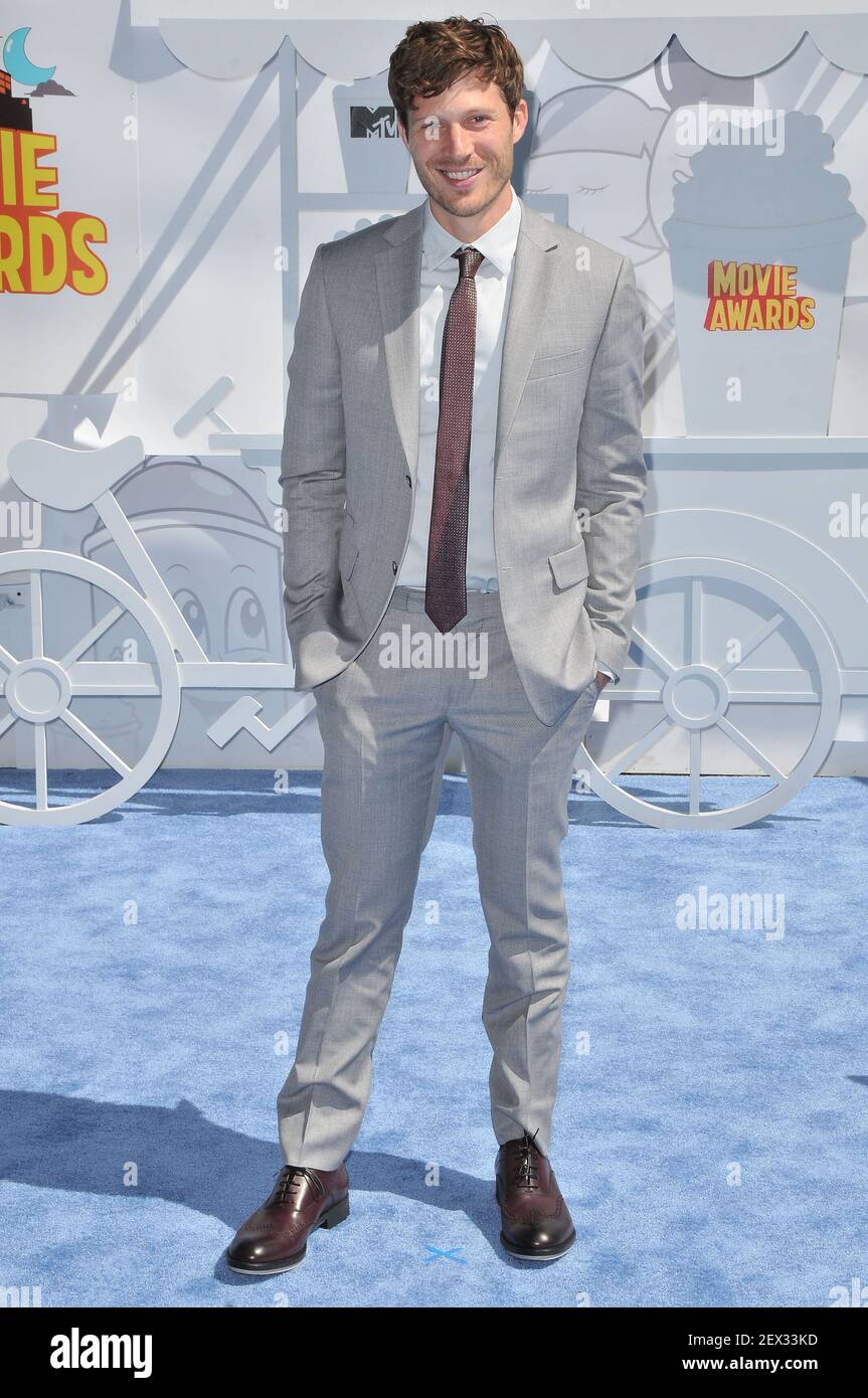 Zach Gilford arrives at the 2015 MTV Movie Awards held at the Nokia ... Zach Gilford arrives at the 2015 MTV Movie Awards held at the Nokia ...
