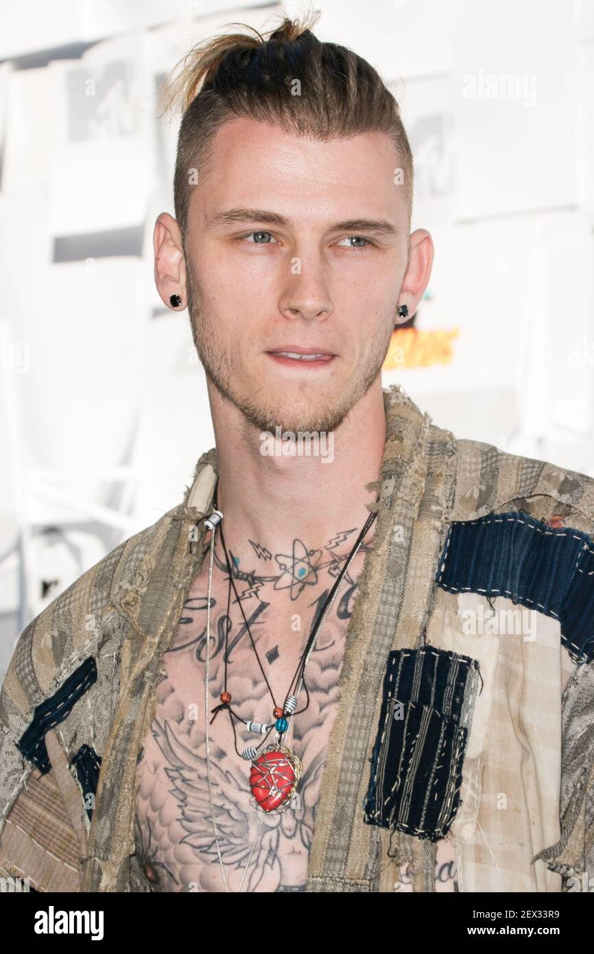 Machine Gun Kelly attends The 2015 MTV Movie Awards at Nokia Theatre L ...
