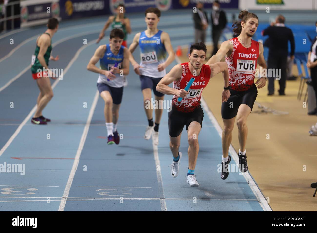 ISTANBUL, TURKEY - FEBRUARY 20, 2021: Athletes running 4x400 metres ...
