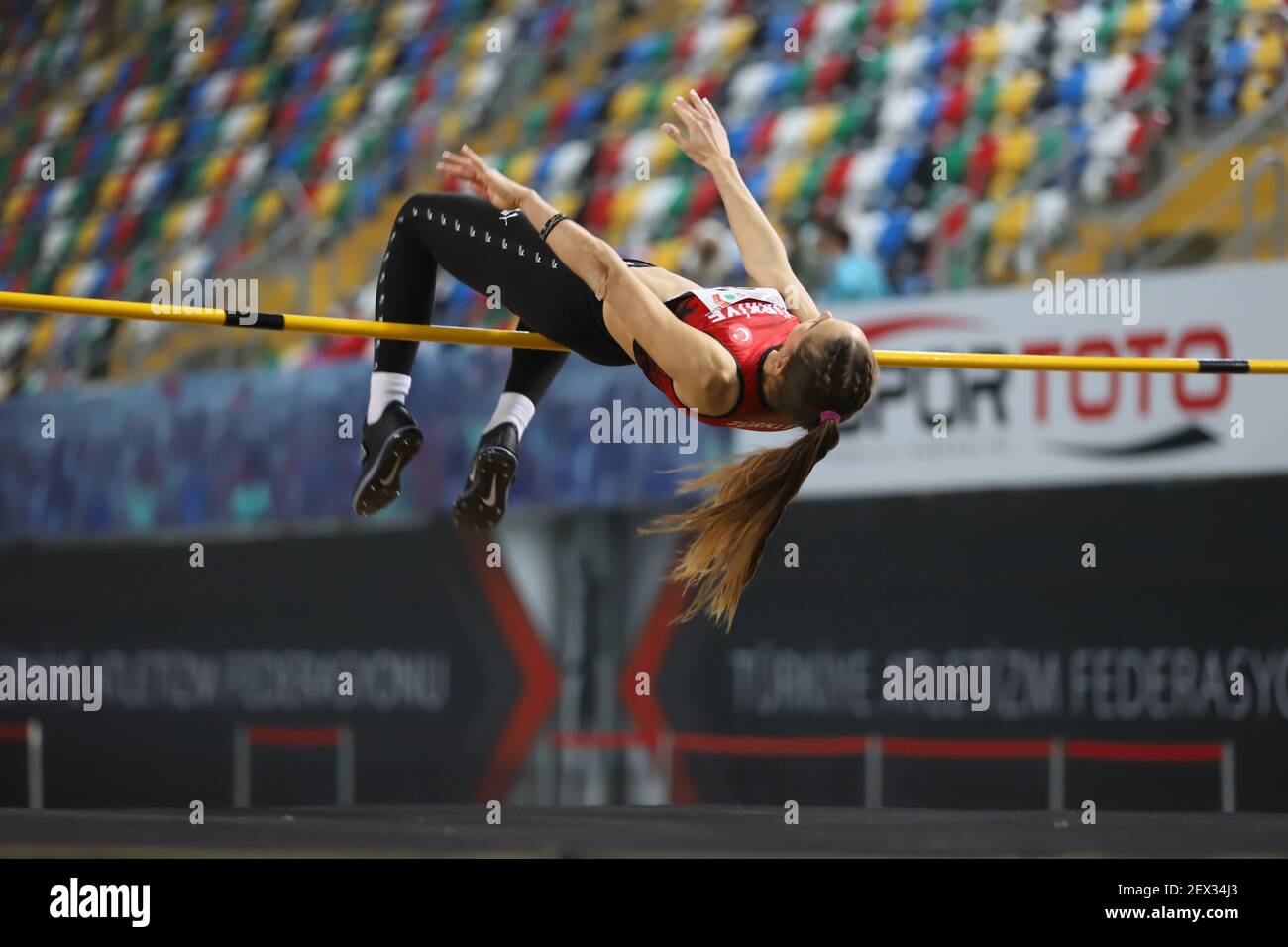 ISTANBUL, TURKEY - FEBRUARY 20, 2021: Undefined athlete high jumping ...