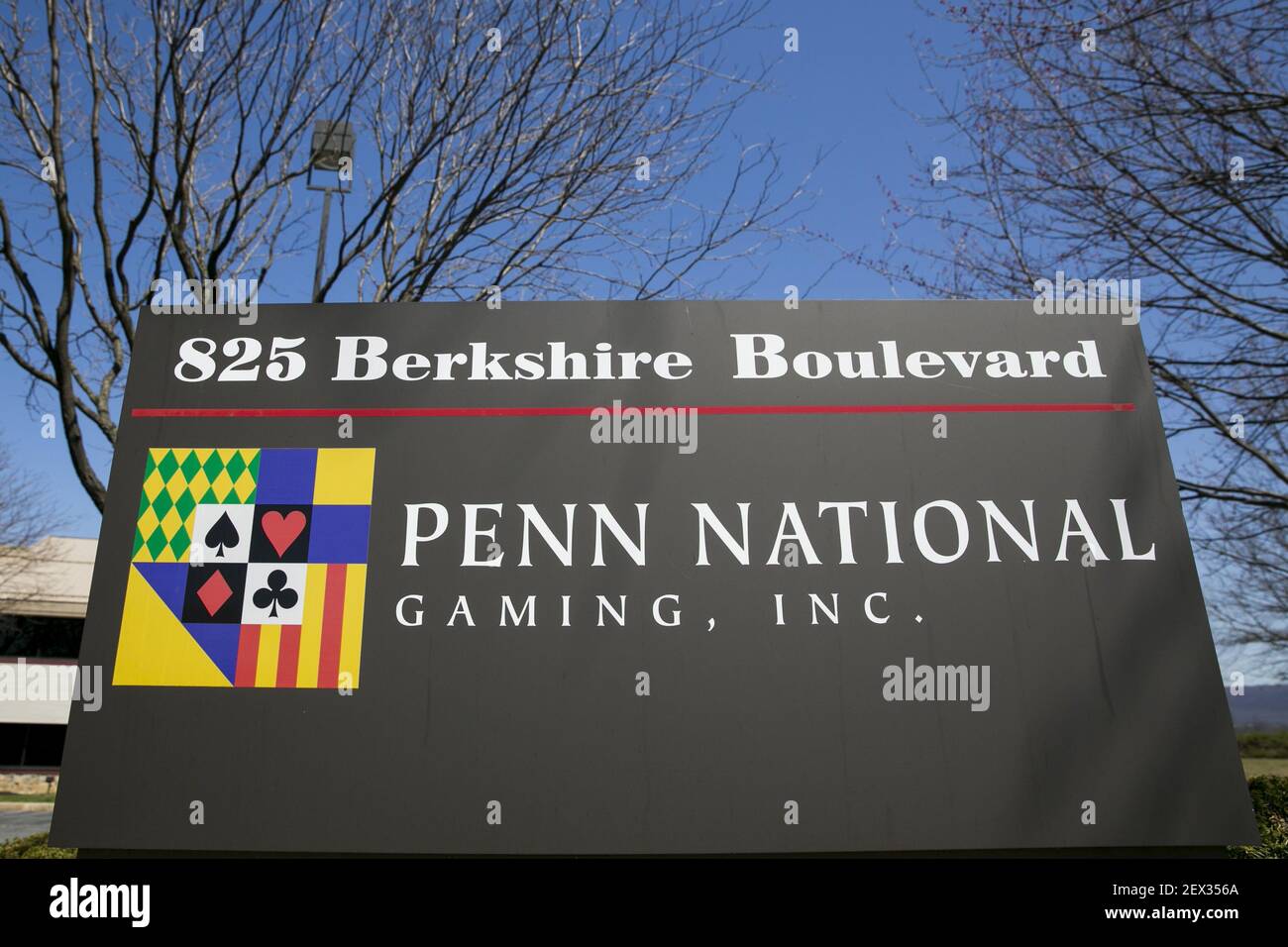 A logo sign outside the headquarters of Penn National Gaming, Inc., in ...