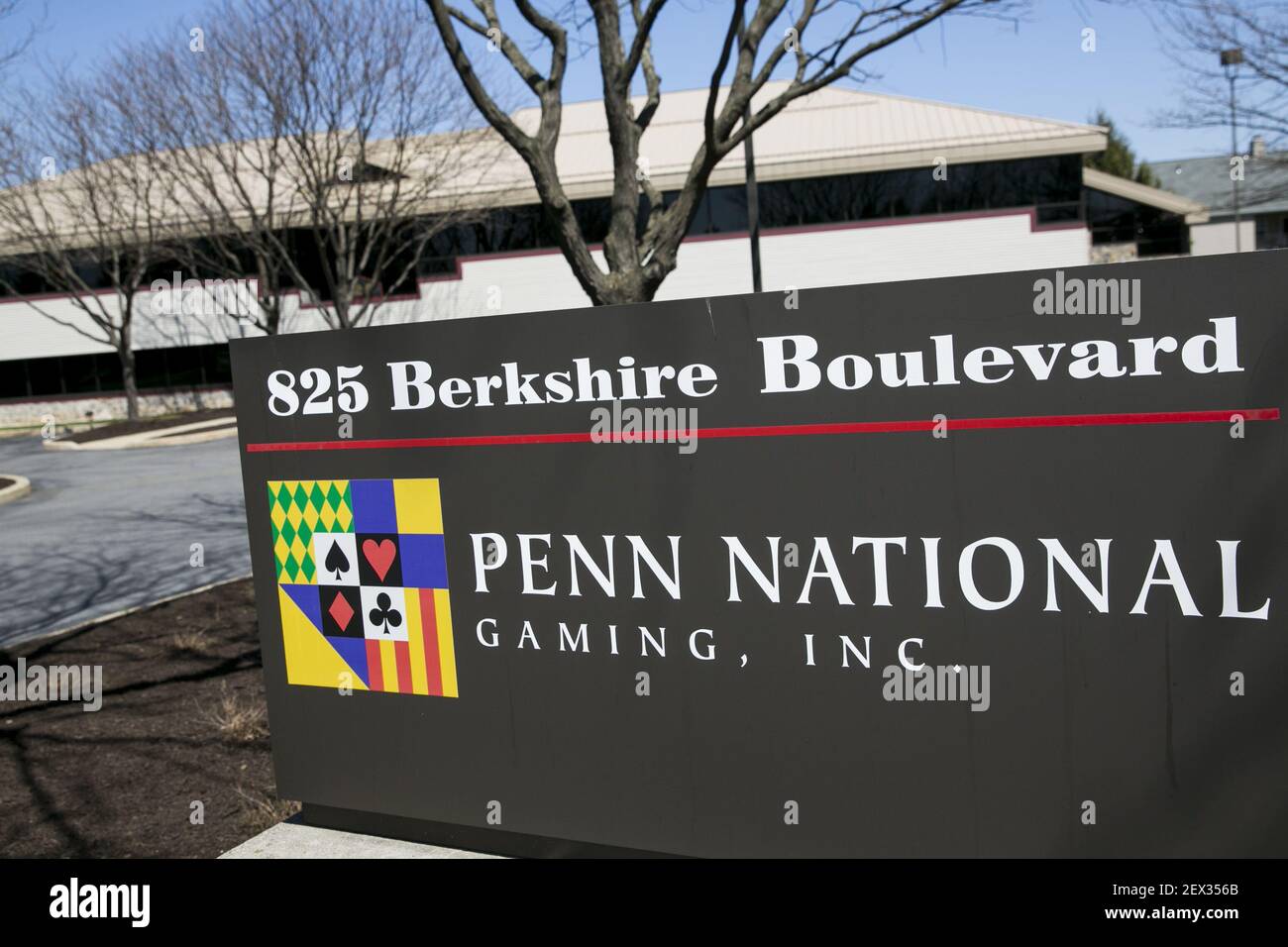 A logo sign outside the headquarters of Penn National Gaming, Inc., in ...