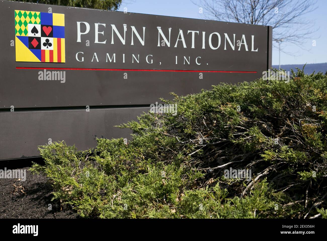 A logo sign outside the headquarters of Penn National Gaming, Inc., in ...