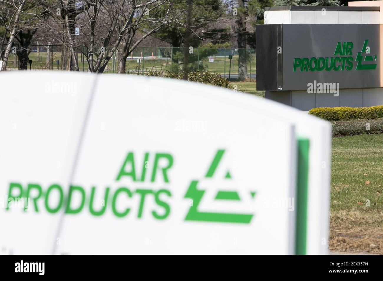 A logo sign outside of the headquarters of Air Products and Chemicals ...