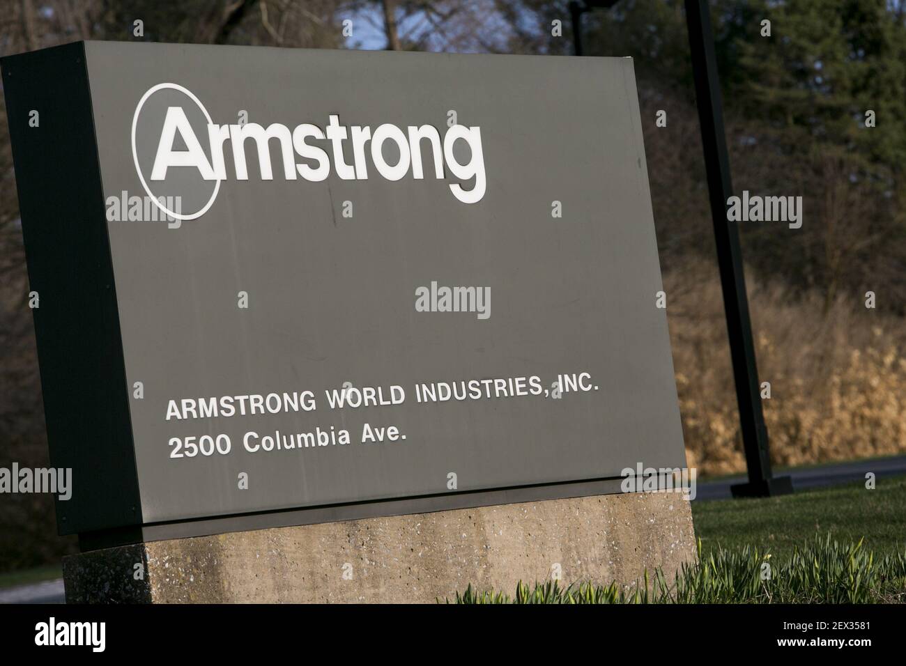 A logo sign outside the headquarters of Armstrong World Industries, Inc ...