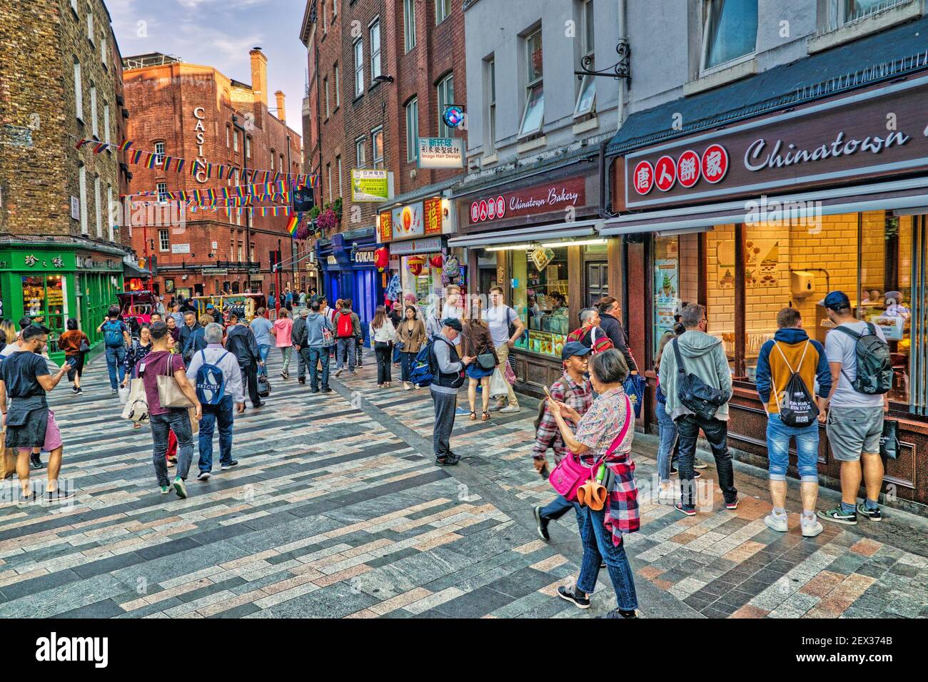 LONDON, UK - JULY 14, 2019: People visit Chinatown district of London ...