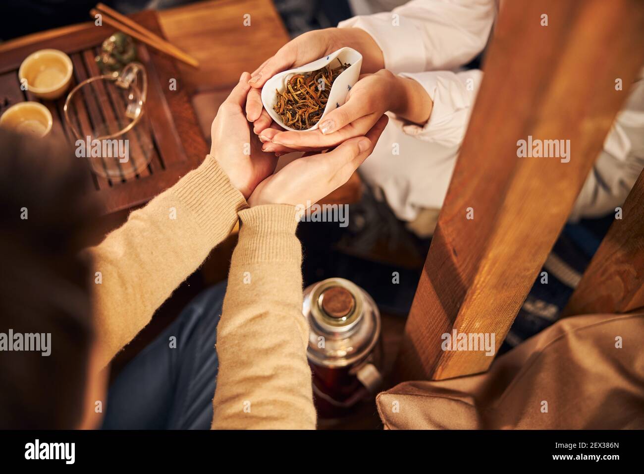 Top view friends hands take hi-res stock photography and images - Alamy