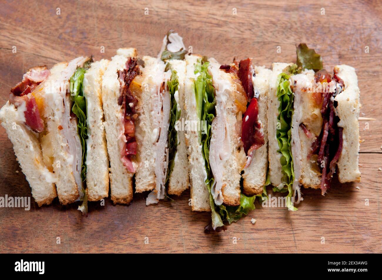 clubhouse sandwich with french fries Stock Photo - Alamy