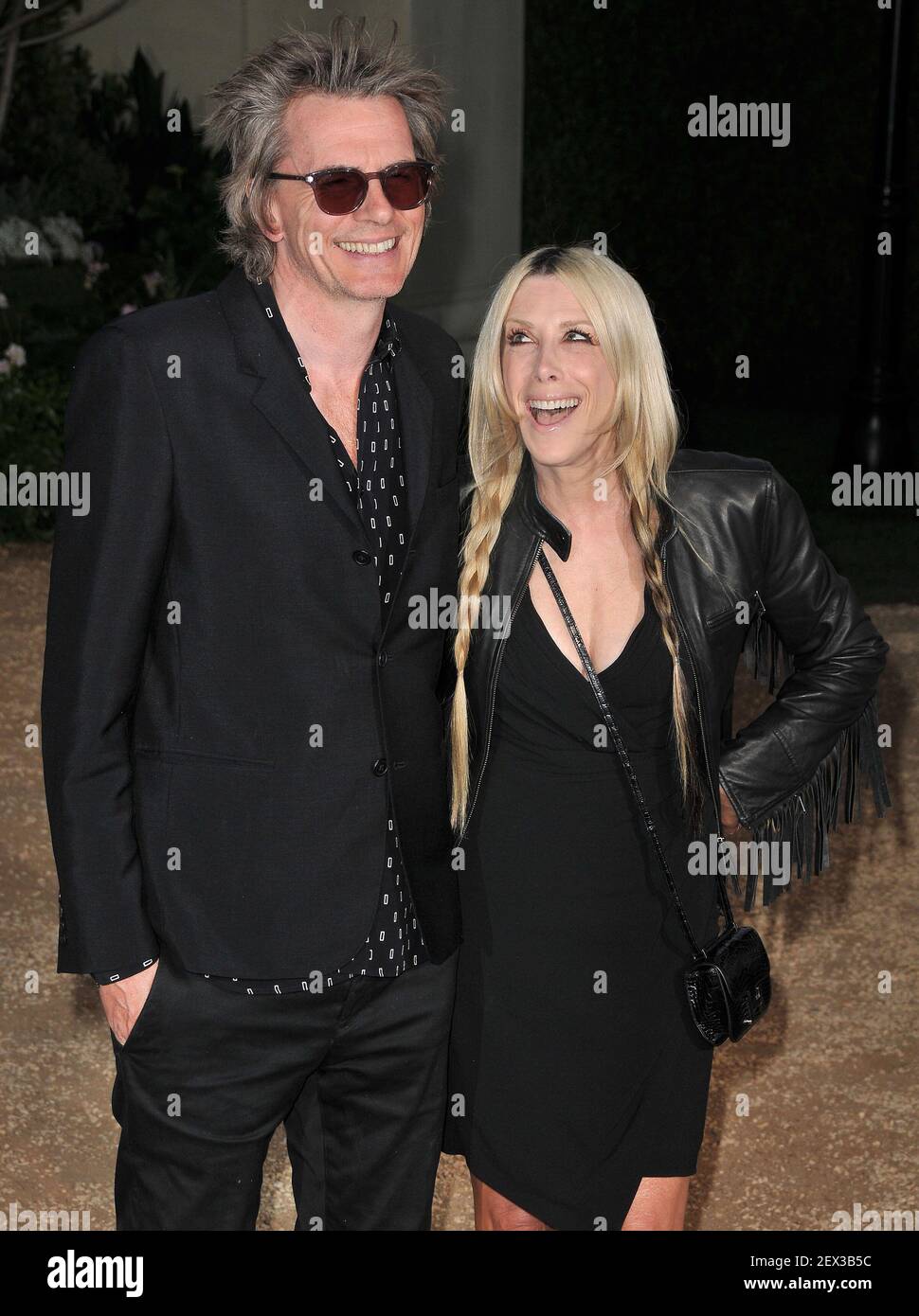 L R John Taylor And Gela Nash Taylor Arrives At The Burberry London