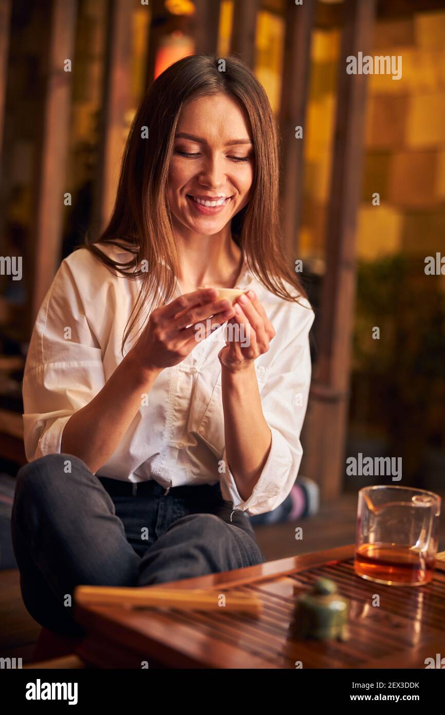 Positive smiley woman enjoying hi-res stock photography and images - Alamy