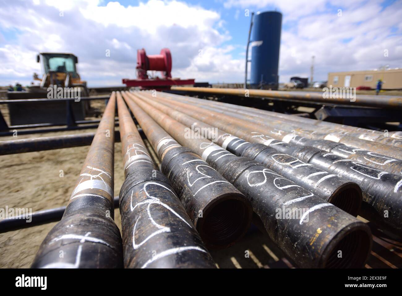 Casings surround the The Ensign 136 drilling rig on the Jonah Field, in ...