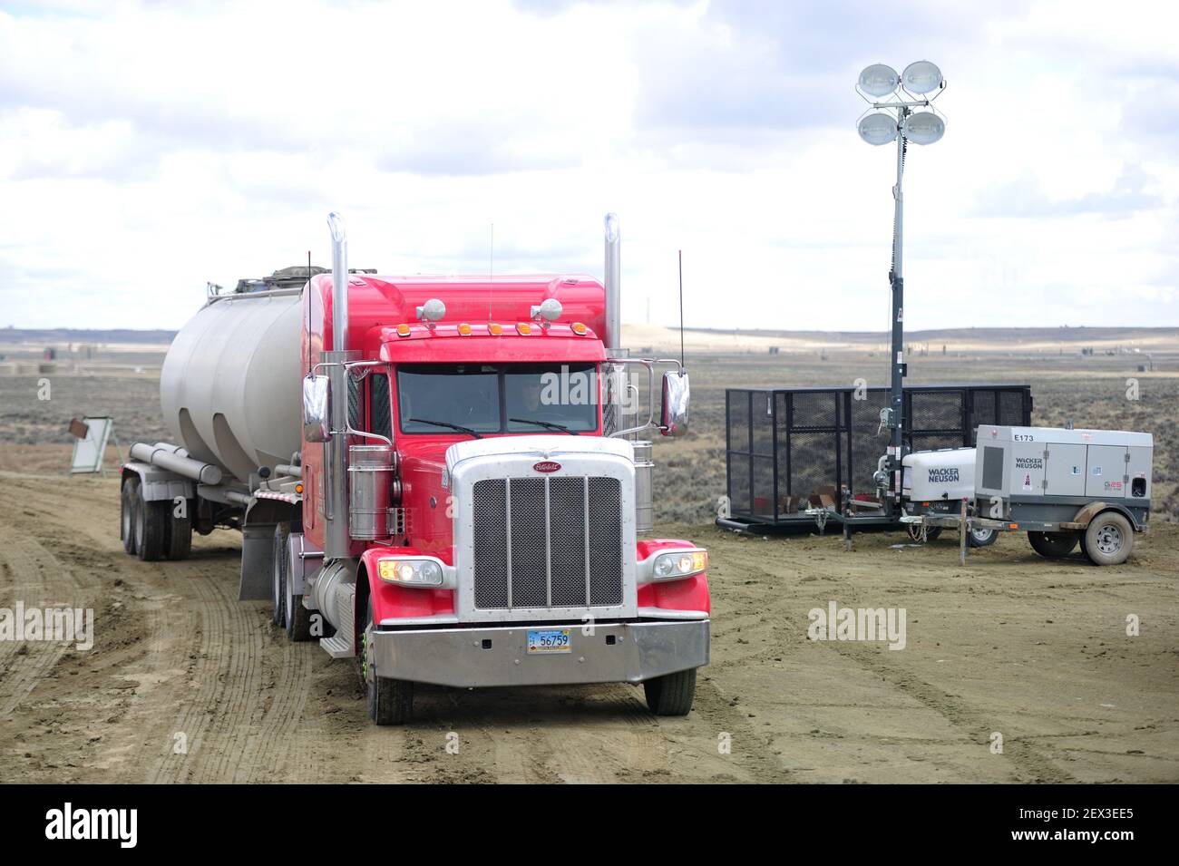 Fracking liquids are delivered to a completion site where Schlumberger ...