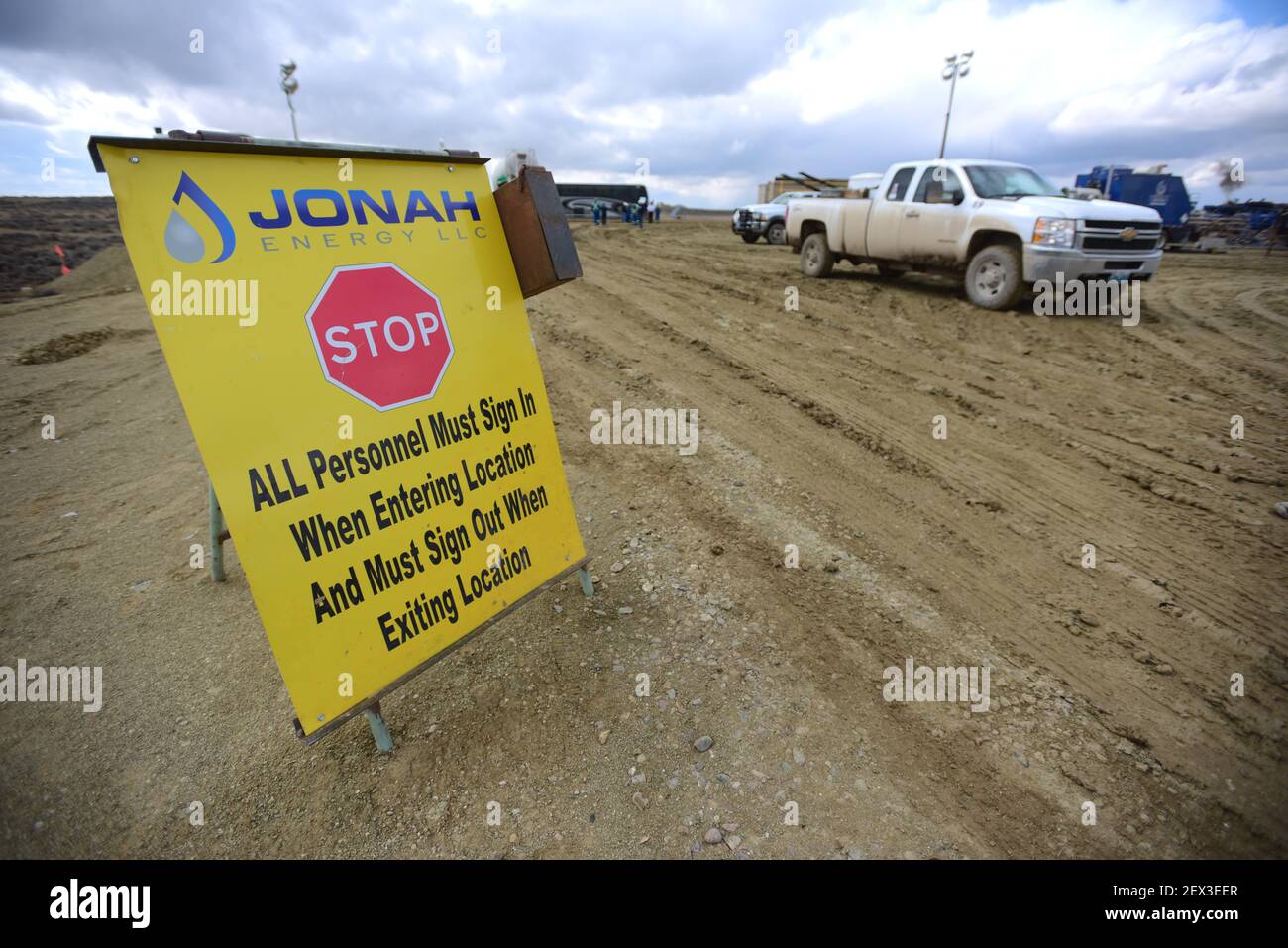 Schlumberger trucks with 2000 horsepower pumps direct water, sand and ...