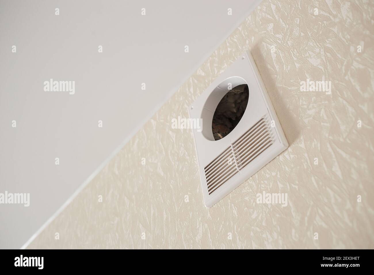 Ventilation system hole in the room. Installing the wall fan vent ...
