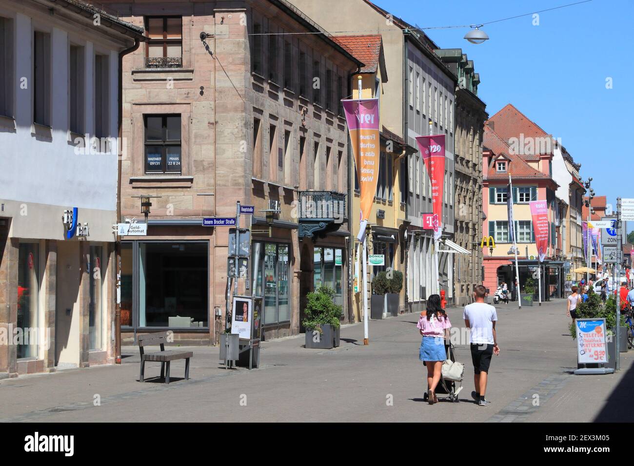 ERLANGEN, GERMANY - MAY 6, 2018: People visit a shopping street in ...