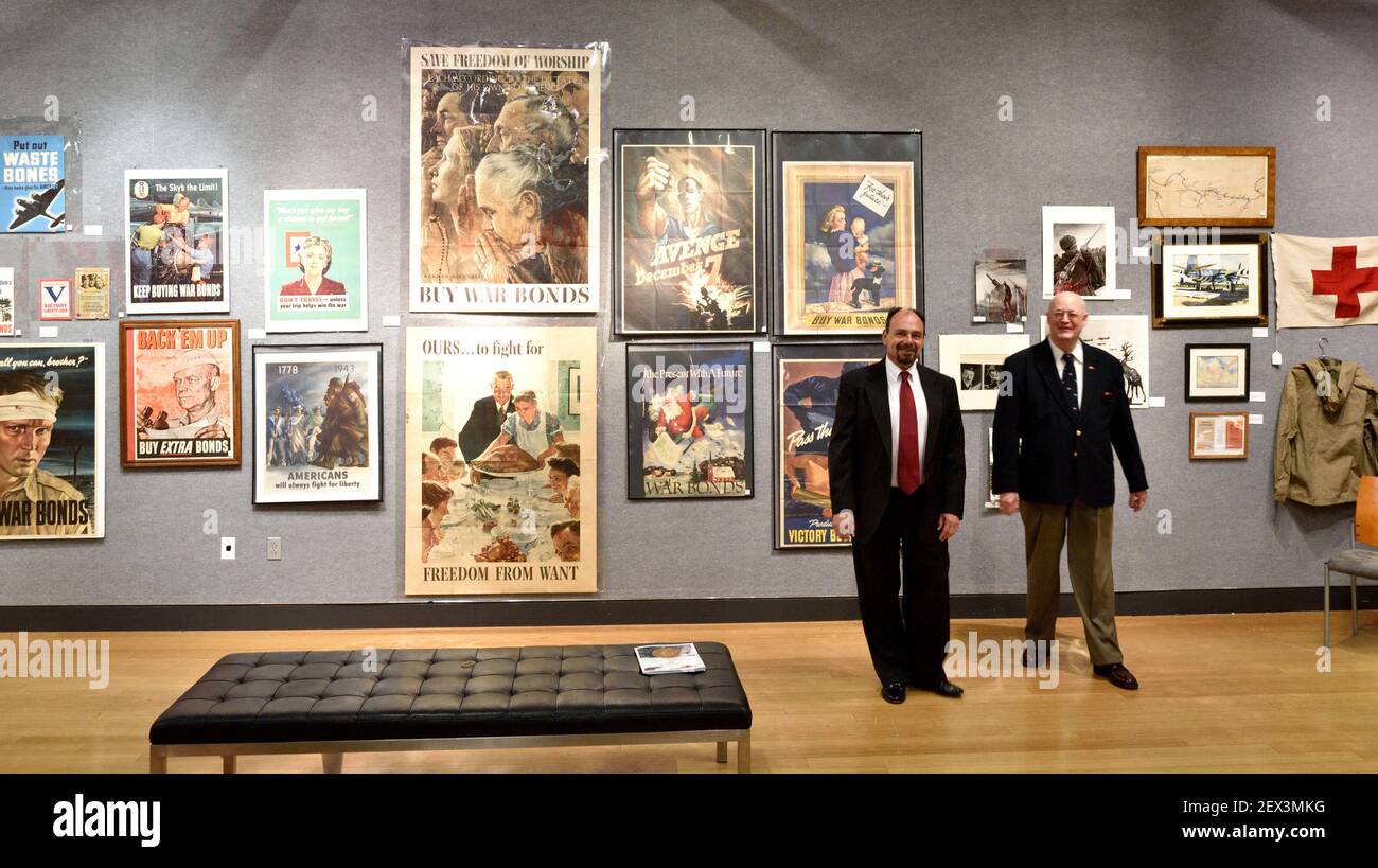 Chris Biache and Rodney Hilton Brown describe items on display at the ...