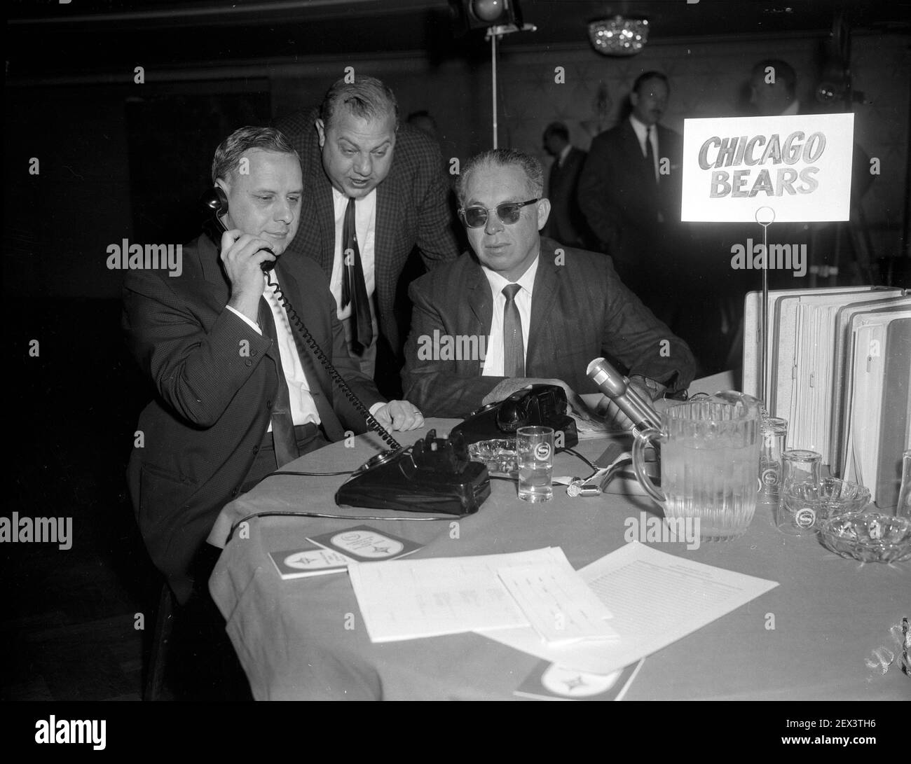 George Halas Jr., from left, Abe Gibron, former Chicago Bears player ...