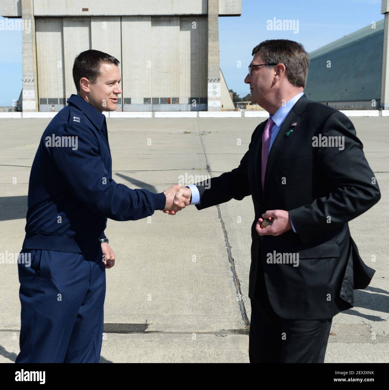 Secretary of Defense Ash Carter presents Airmen with the SECDEF coin ...