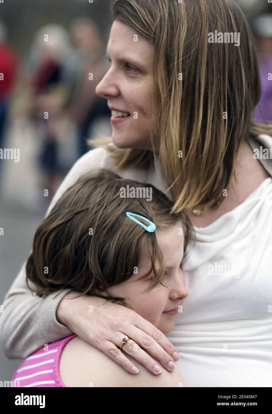 Molly Vergin, 8, hugs her mother Stephanie at Silverwood Park in St ...