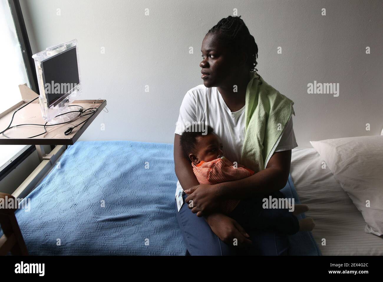 Cayesha Shivers holds her son Kori Anderson in the private room she ...