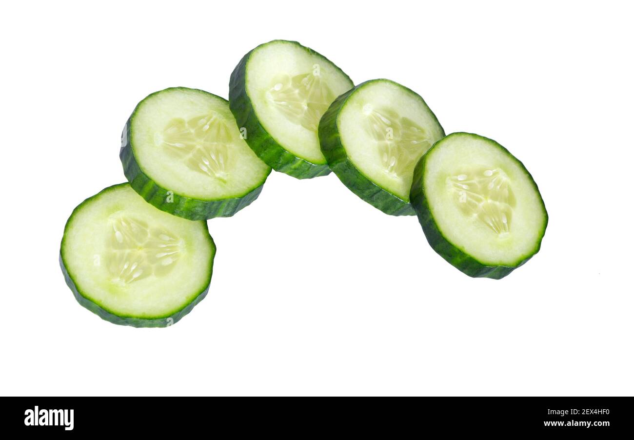 Cucumber. Fresh cucumber slices isolated on white background Stock ...