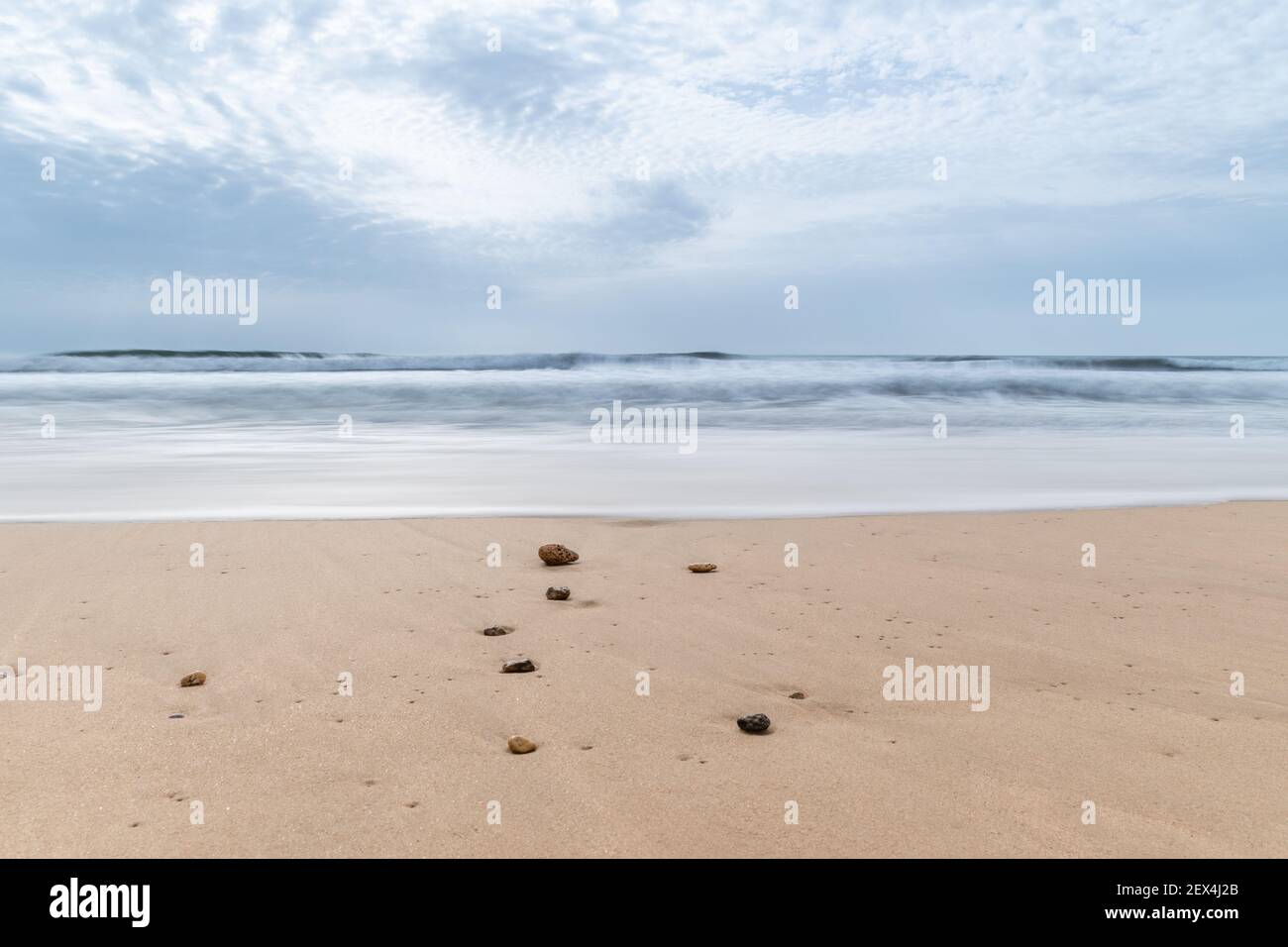 Smooth waves on sand beach in France - Atlantic Ocean Stock Photo - Alamy