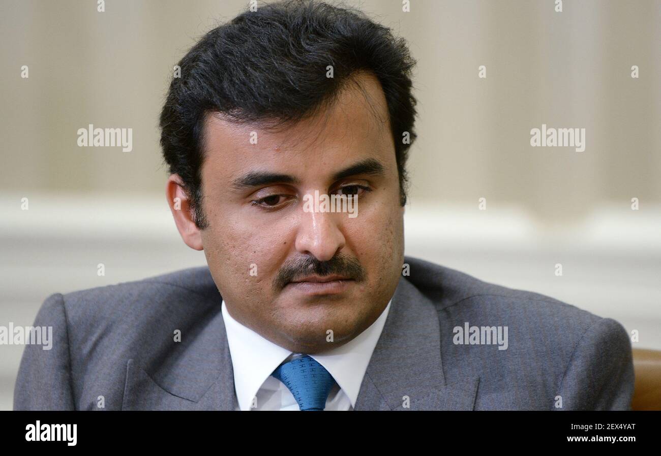 The Amir of Qatar, His Highness Sheikh Tamim bin Hamad al Thani looks on during a meeting with ...