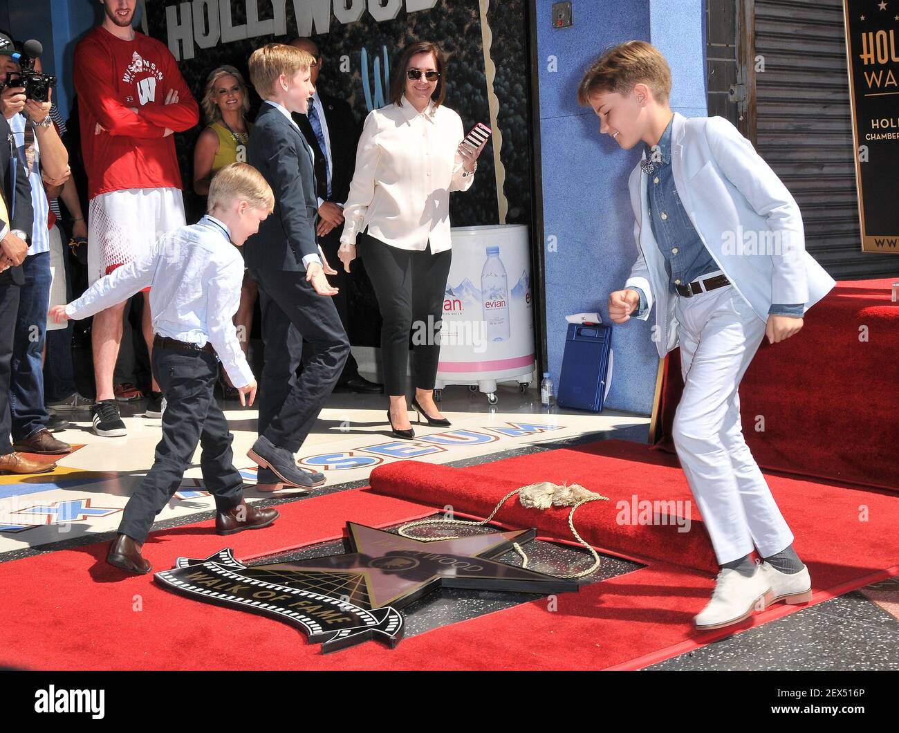 Will Ferrell's Children walking around the star at the Will Ferrell ...