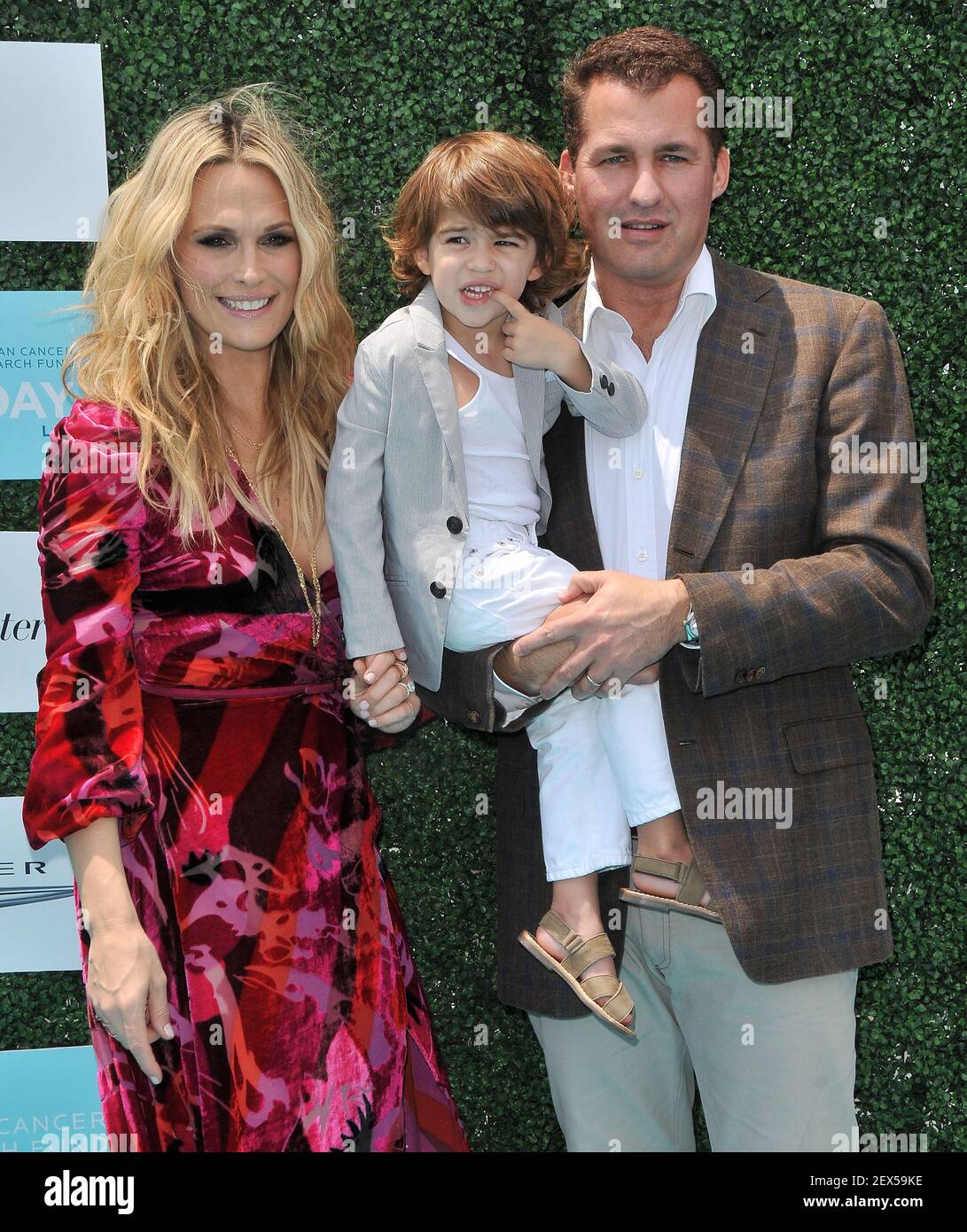 (L-R) Molly Sims, Son Brooks Stuber and Husband Scott Stuber arrives at ...