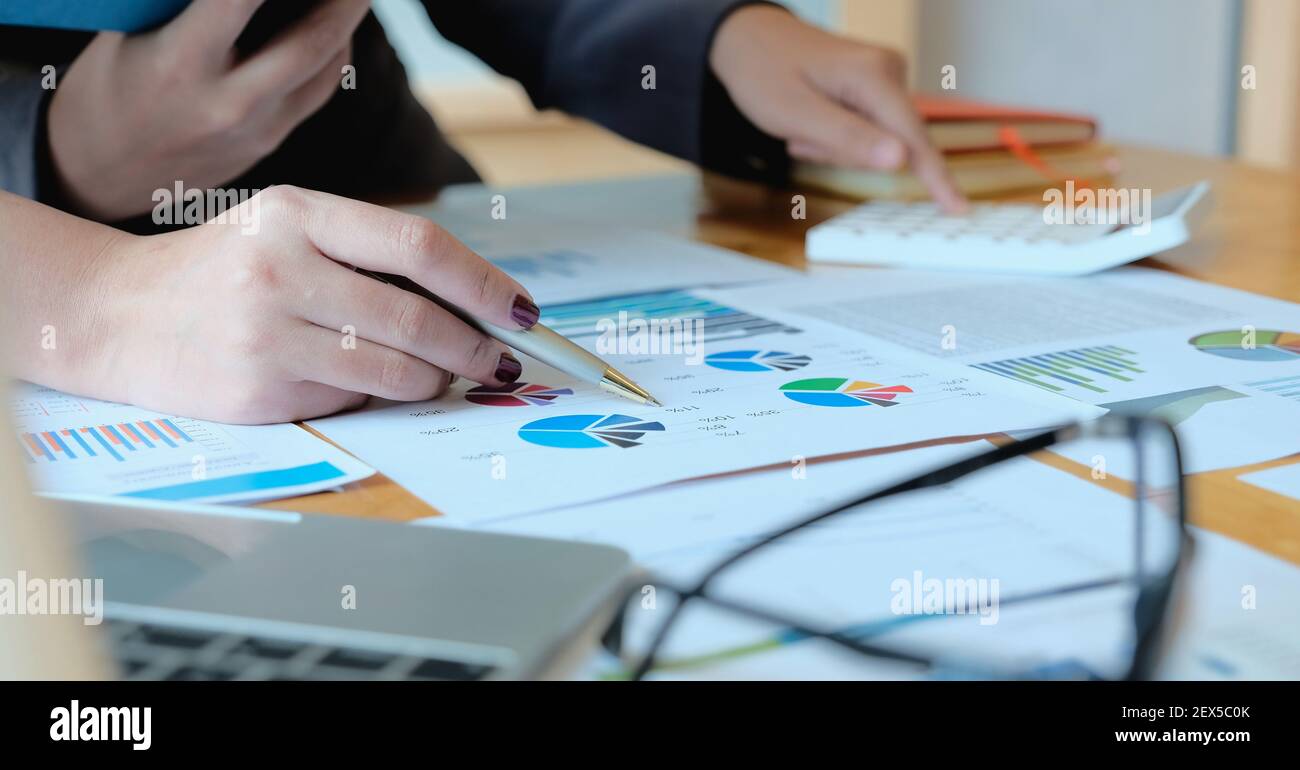 Two accountant discussion analysis sharing calculations about the ...