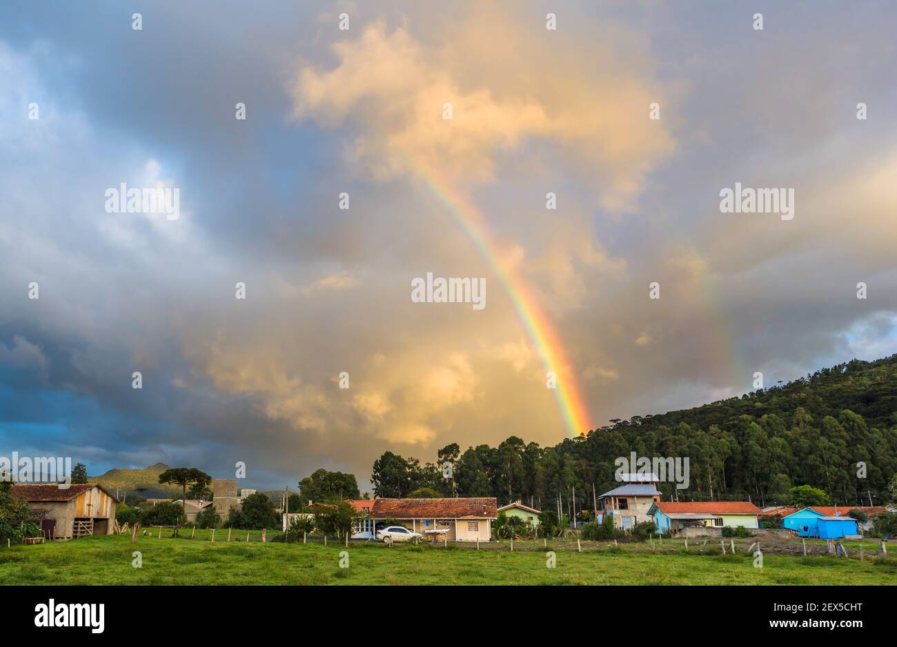 The beautiful rainbow in the city of Urubici, SC, Brazil Stock Photo ...