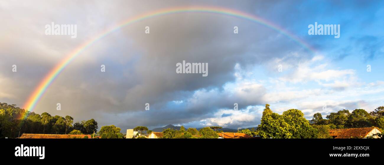 The beautiful rainbow in the city of Urubici, SC, Brazil Stock Photo ...
