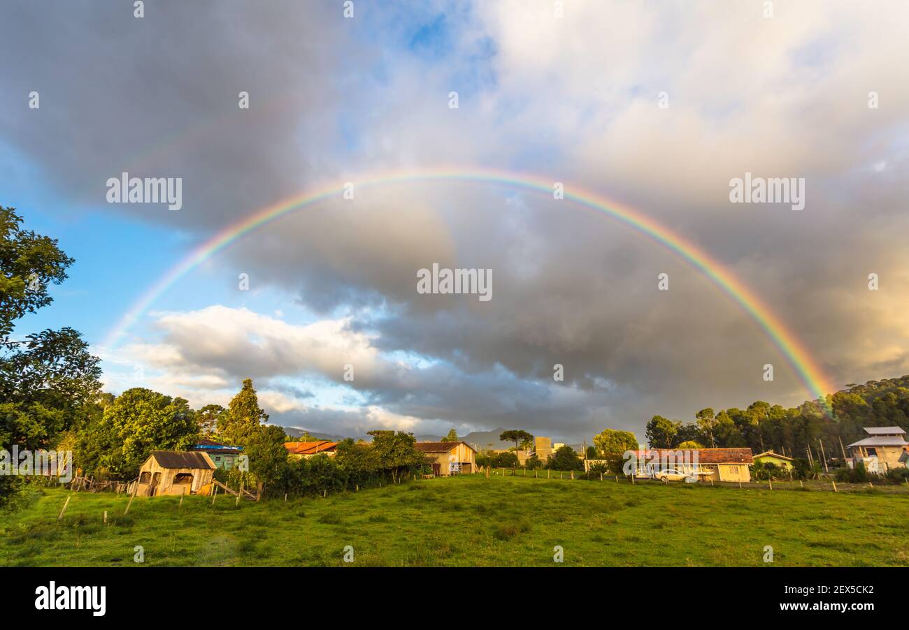The beautiful rainbow in the city of Urubici, SC, Brazil Stock Photo ...