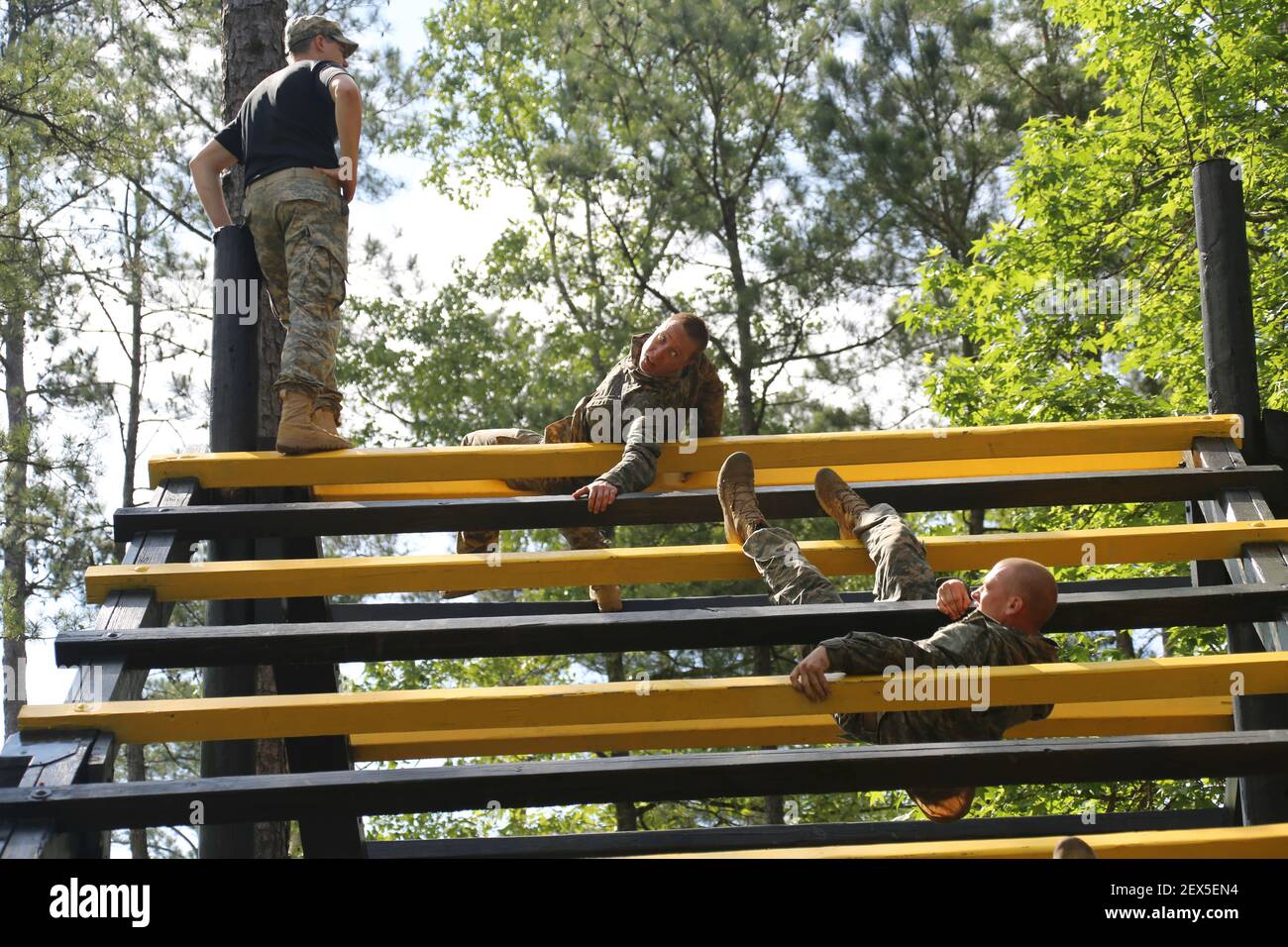 U.S. Army soldiers negotiate the Darby Queen obstacle course during the ...