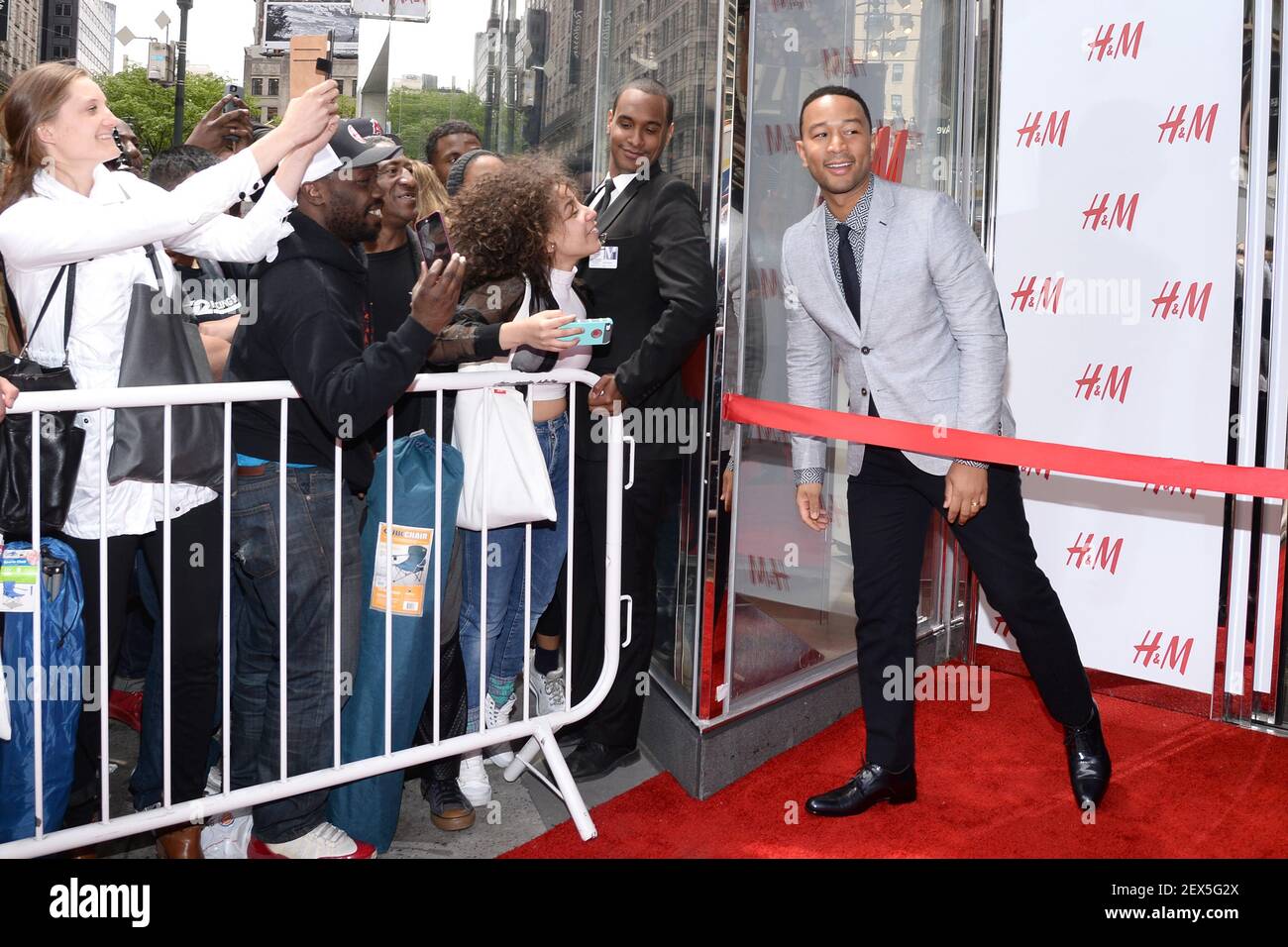 Musician John Legend attends the ribbon cutting ceremony for the ...