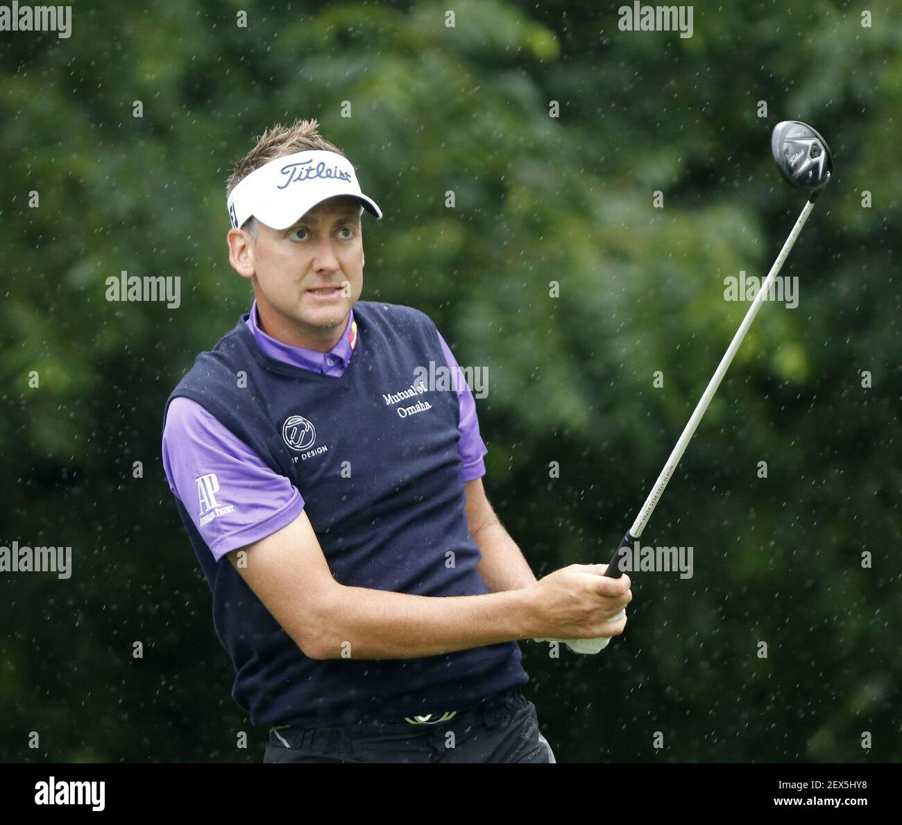 Ian Poulter tees off on the sixth hole on the second day of the Crowne ...