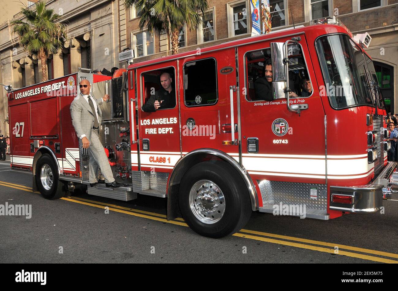 Dwayne Johnson arrives in a firetruck at the "San Andreas" Los Angeles ...