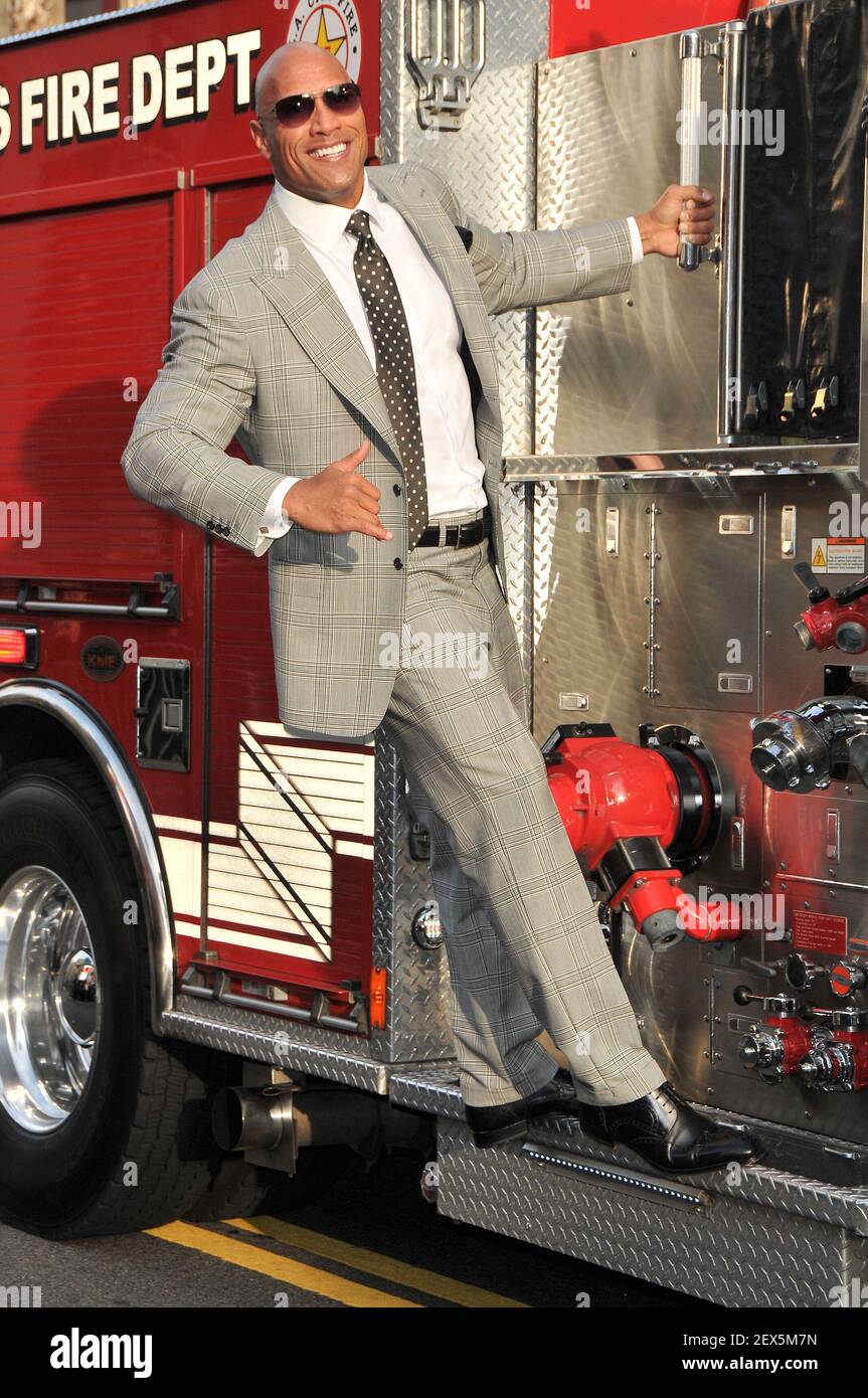 Dwayne Johnson arrives in a firetruck at the "San Andreas" Los Angeles ...