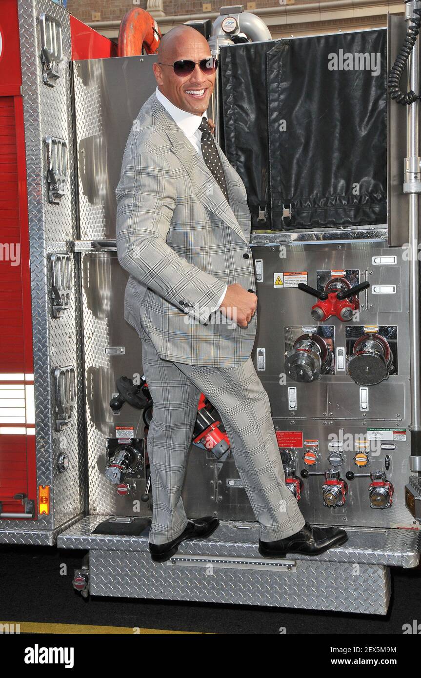 Dwayne Johnson arrives in a firetruck at the "San Andreas" Los Angeles ...