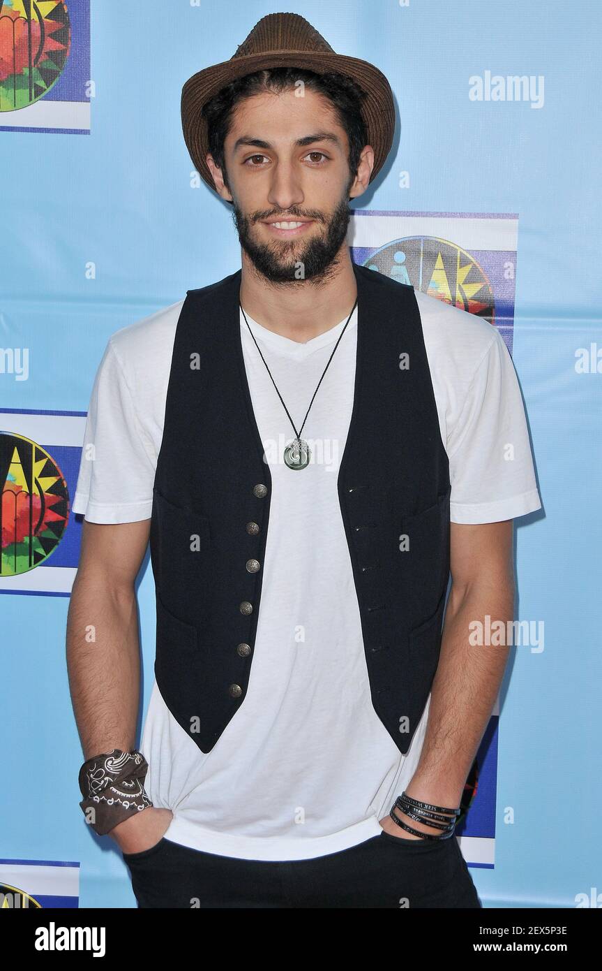 Azim Rizk arrives at the Let's Celebrate! District Wide Arts Festival ...