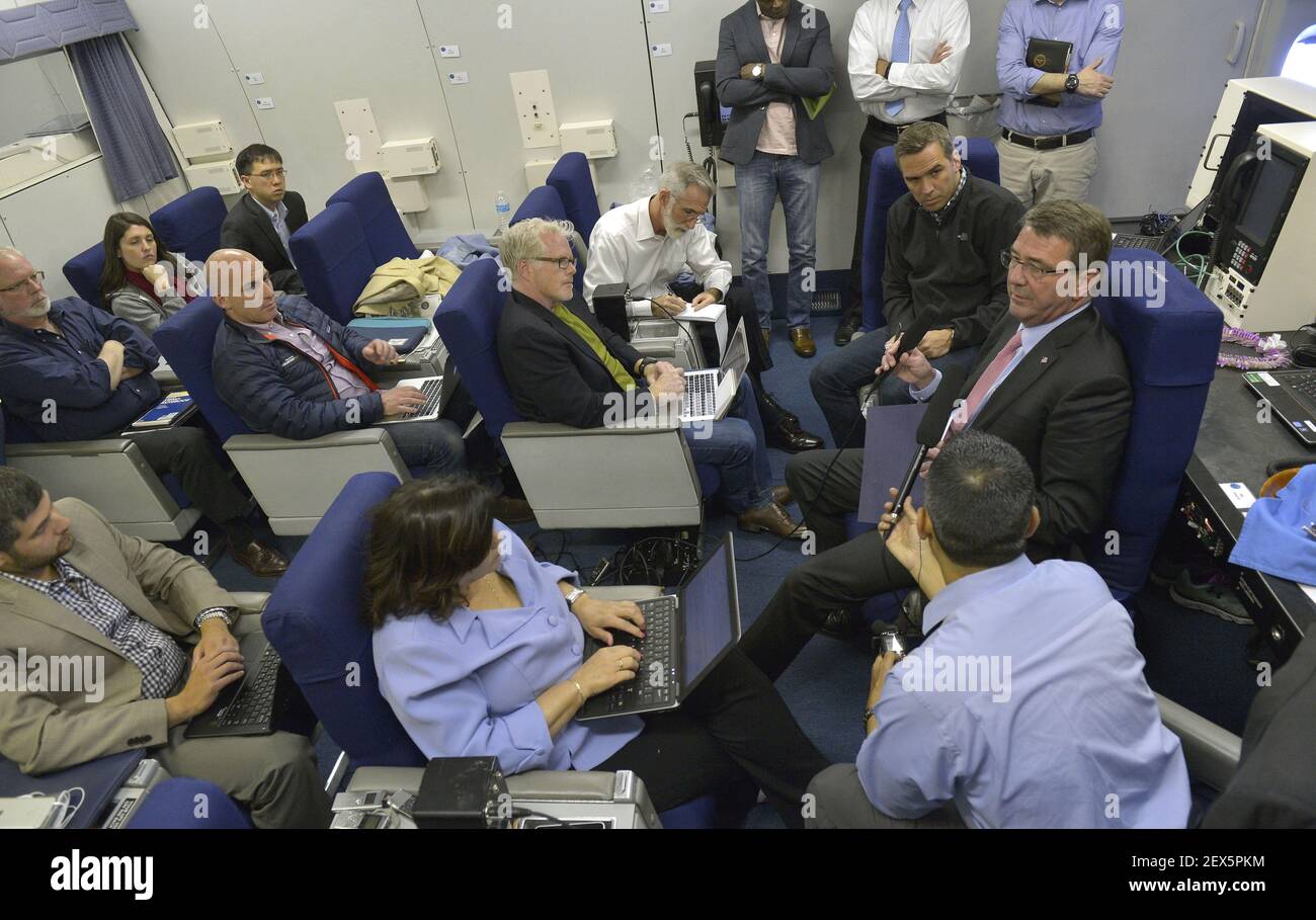 Secretary of Defense Ash Carter holds a press gaggle while in flight ...