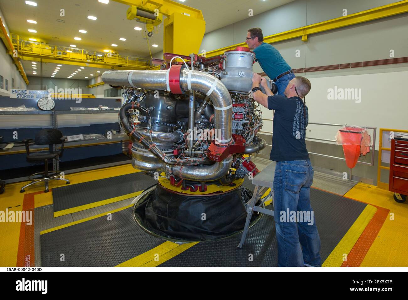 Aerojet Rocketdyne technicians put the final touches on the 16th engine ...